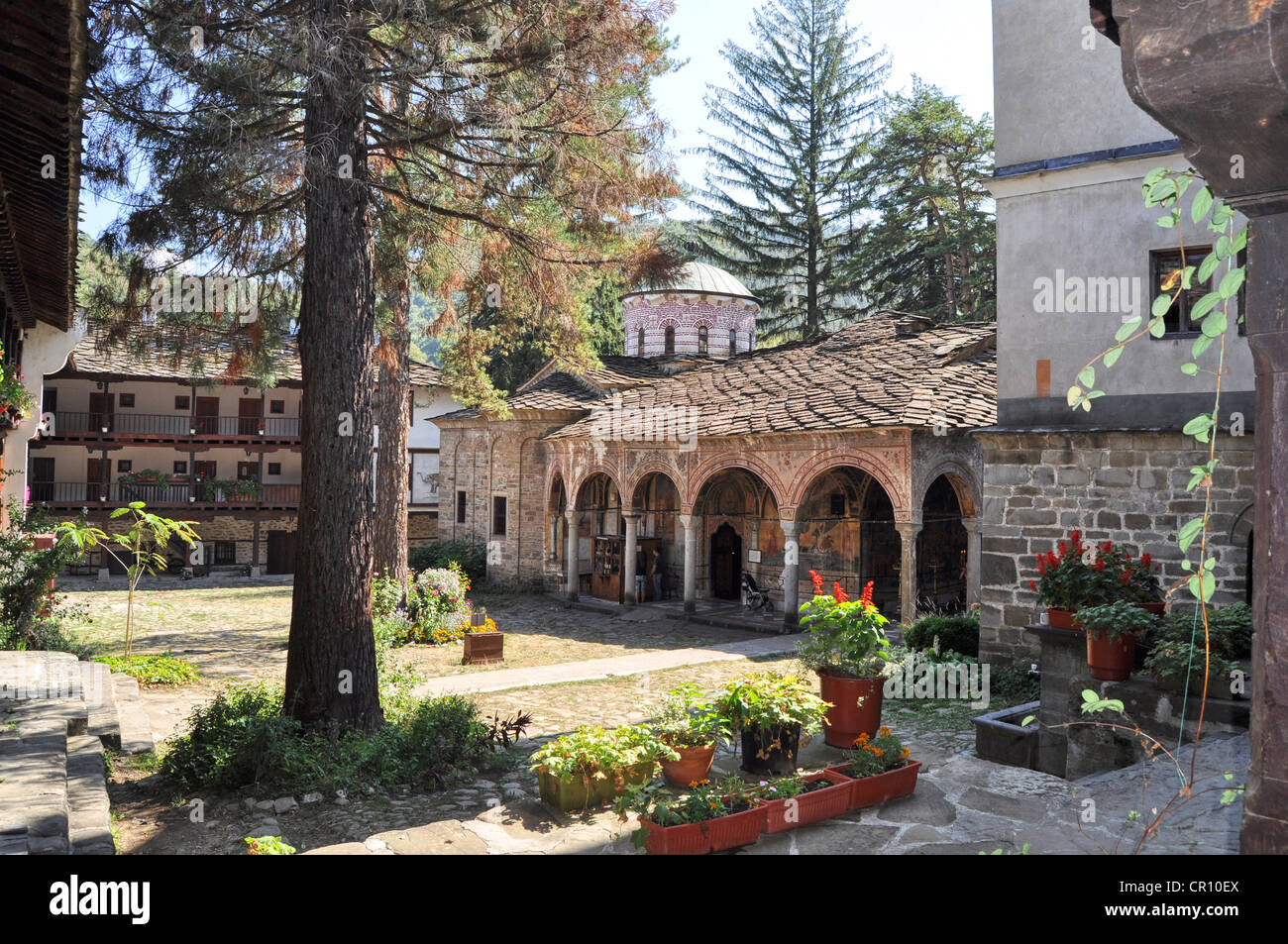 The yard of christian orthodox monastery, including church Stock Photo ...