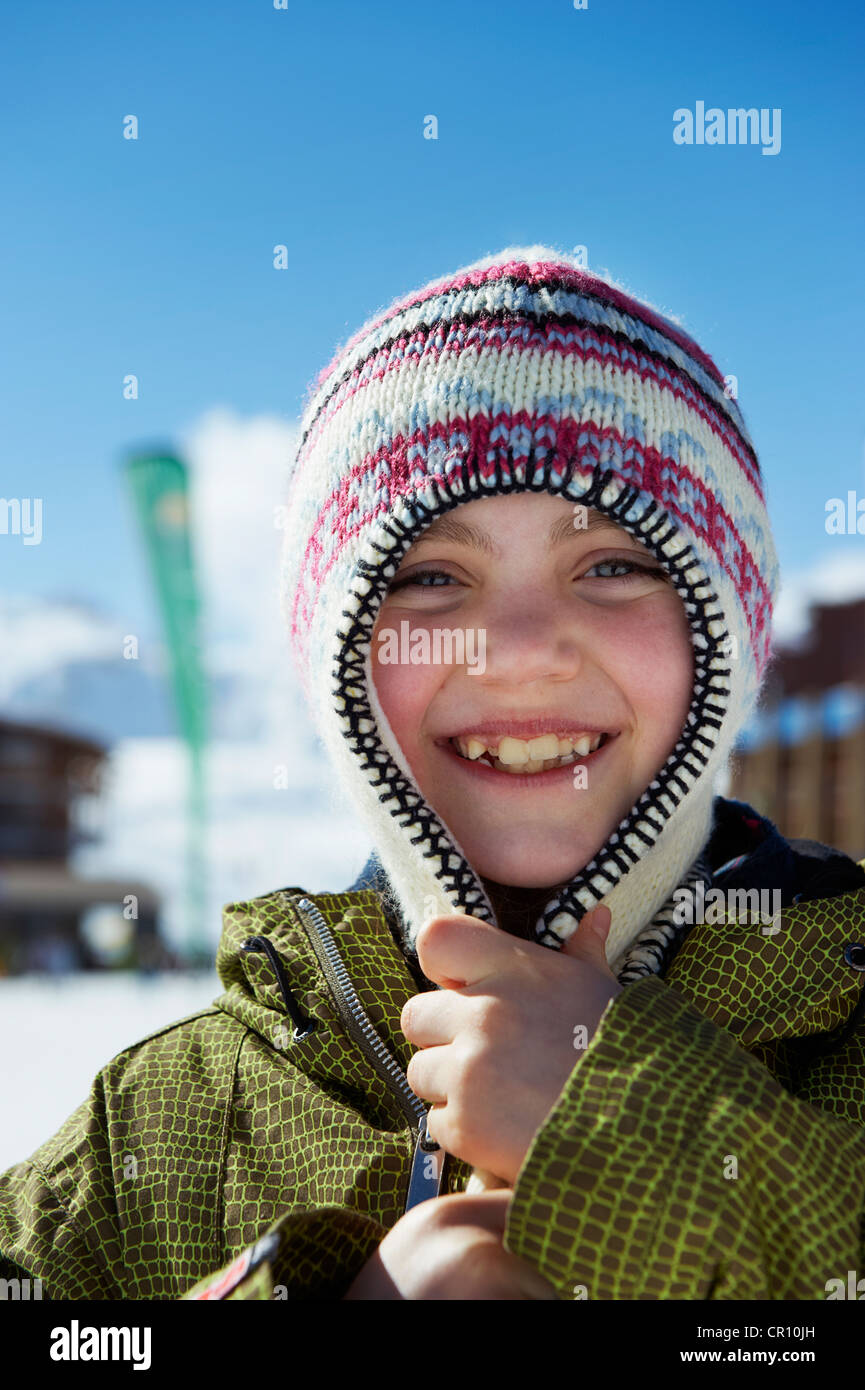 Smiling girl wearing knitted cap Stock Photo - Alamy
