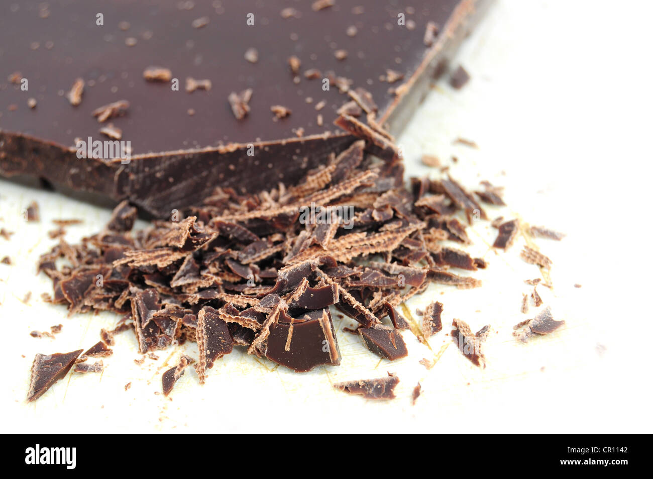 Extreme closeup of chopped chocolate pieces, isolated Stock Photo - Alamy