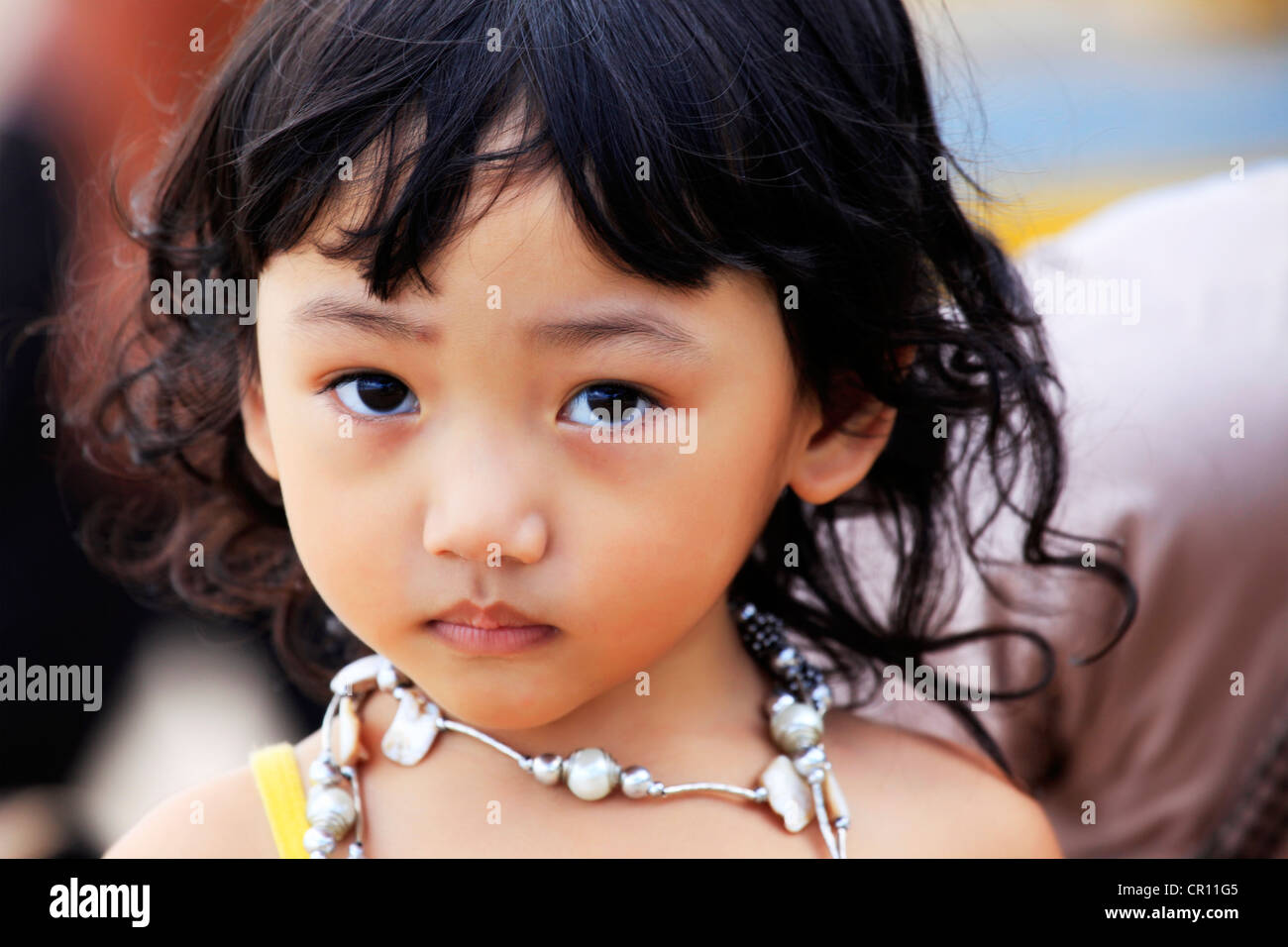 Portrait of the beautiful small Asian girl. Indonesia. Java Stock Photo ...