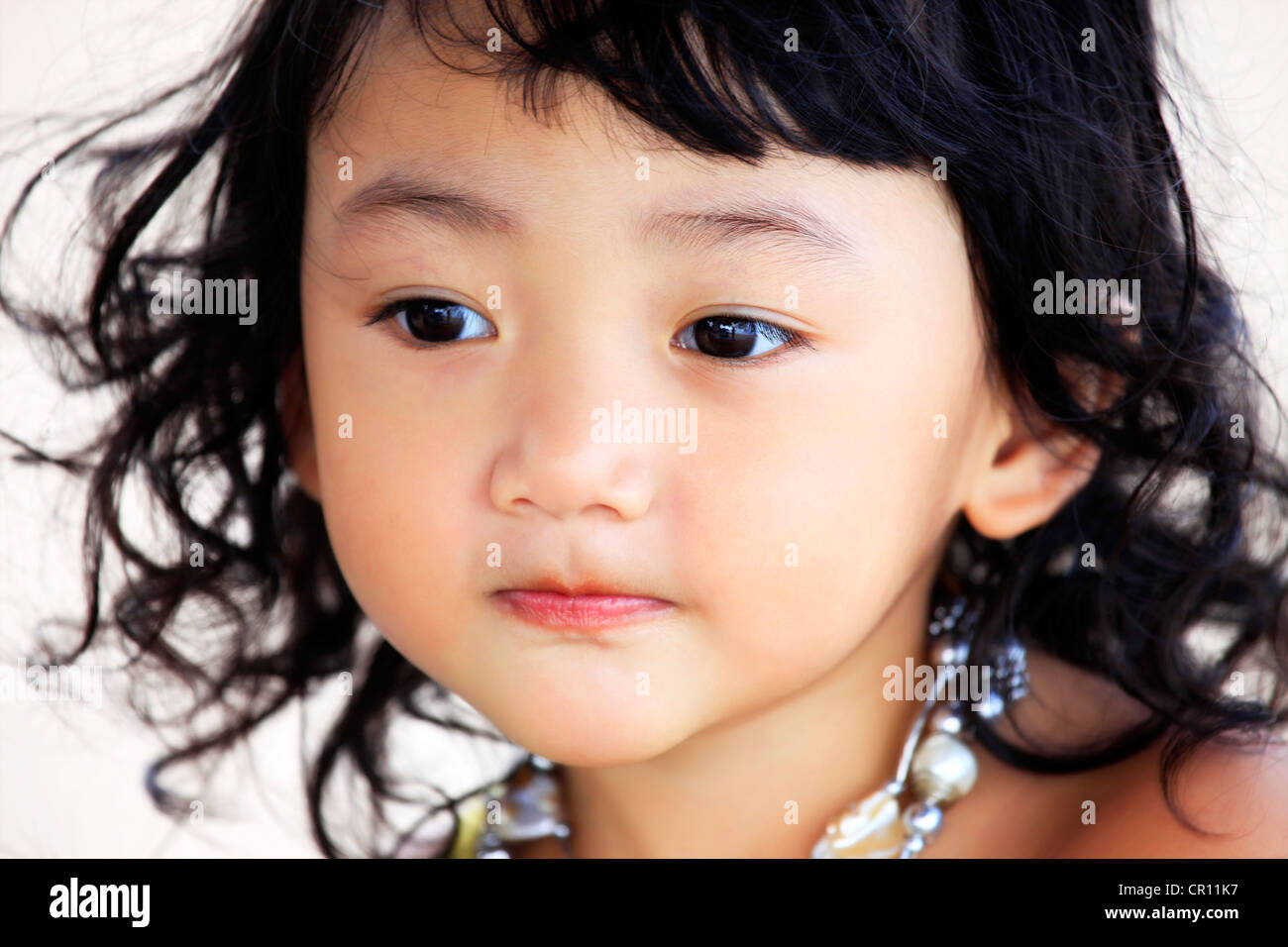 Portrait of the beautiful small Asian girl. Indonesia. Java Stock Photo ...