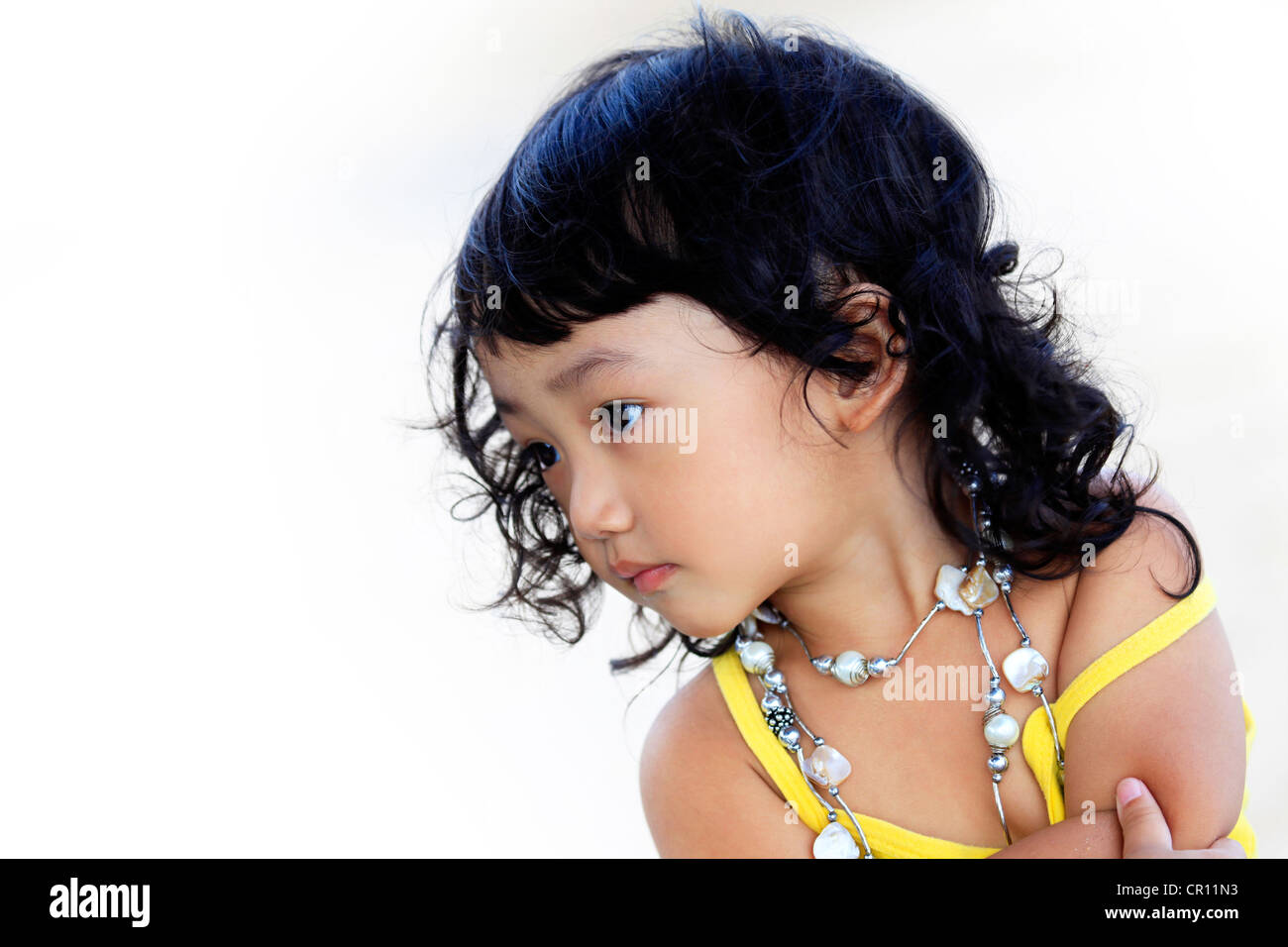 Portrait of the beautiful small Asian girl. Indonesia. Java Stock Photo ...