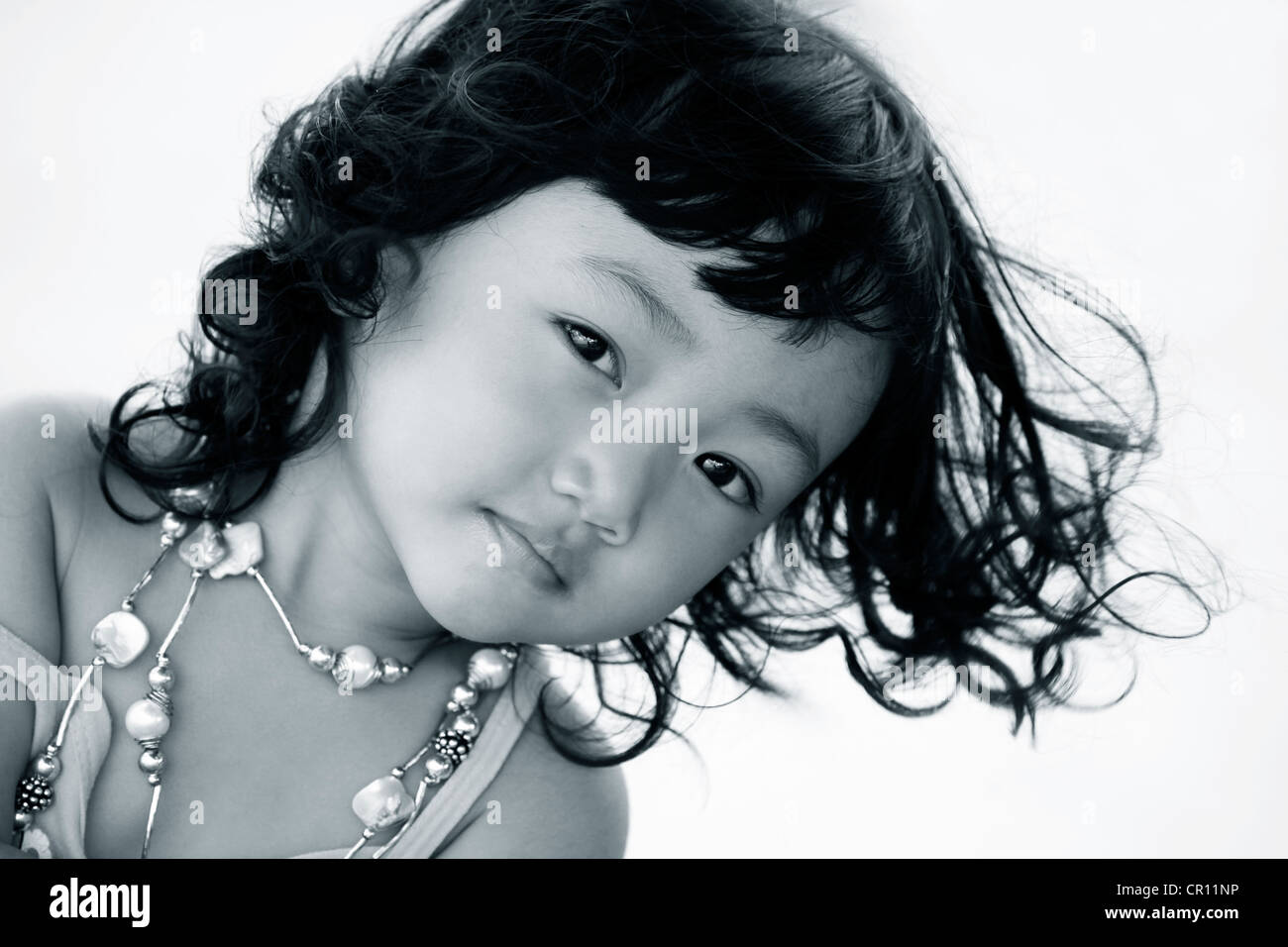 Portrait of the beautiful small Asian girl. Indonesia. Java Stock Photo ...