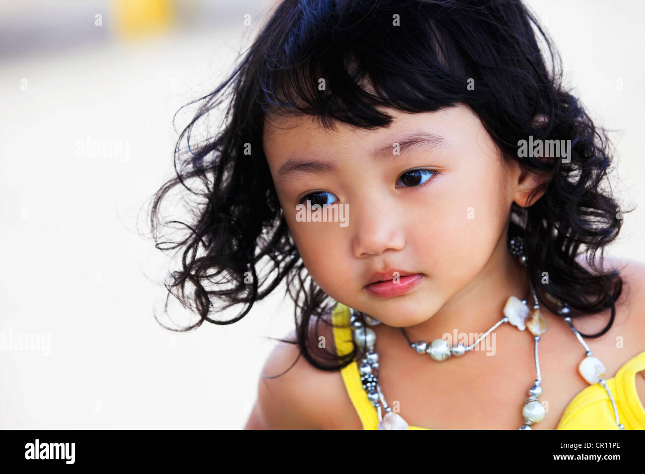 Portrait of the beautiful small Asian girl. Indonesia. Java Stock Photo ...