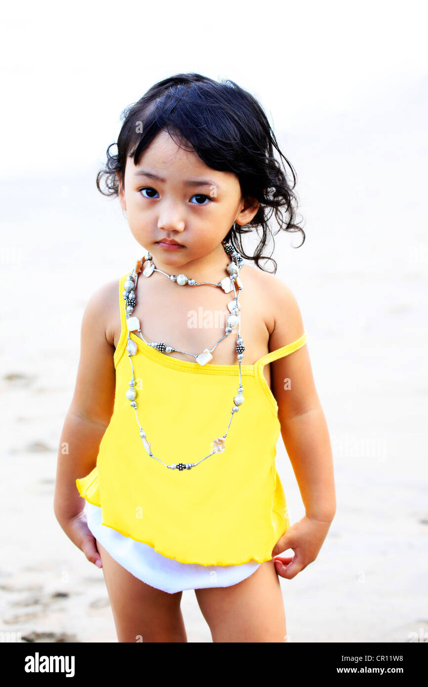 Portrait of the beautiful small Asian girl. Indonesia. Java Stock Photo ...