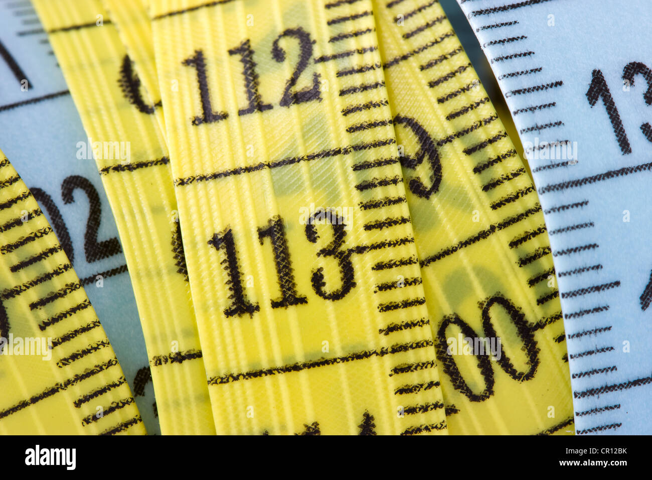 close-up view of yellow and blue measuring tape Stock Photo - Alamy