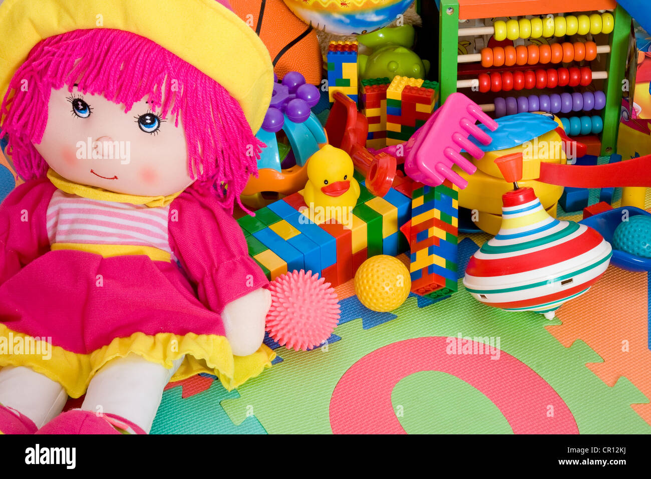 huge pile of various colorful children's toys Stock Photo - Alamy