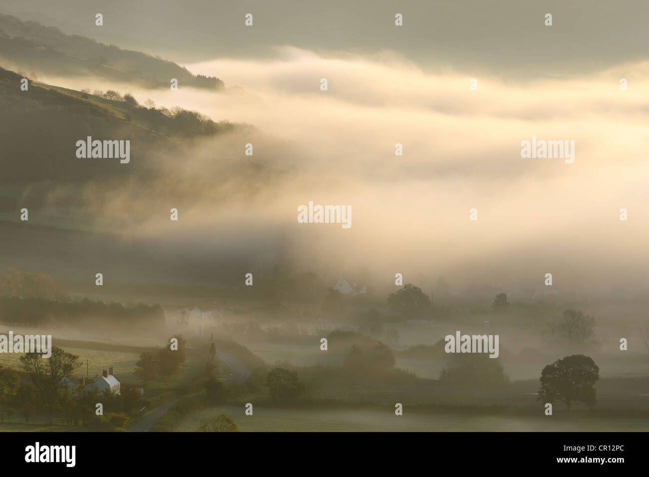 Mist clinging to the slopes of the Mendip Hills, Somerset, UK Stock ...