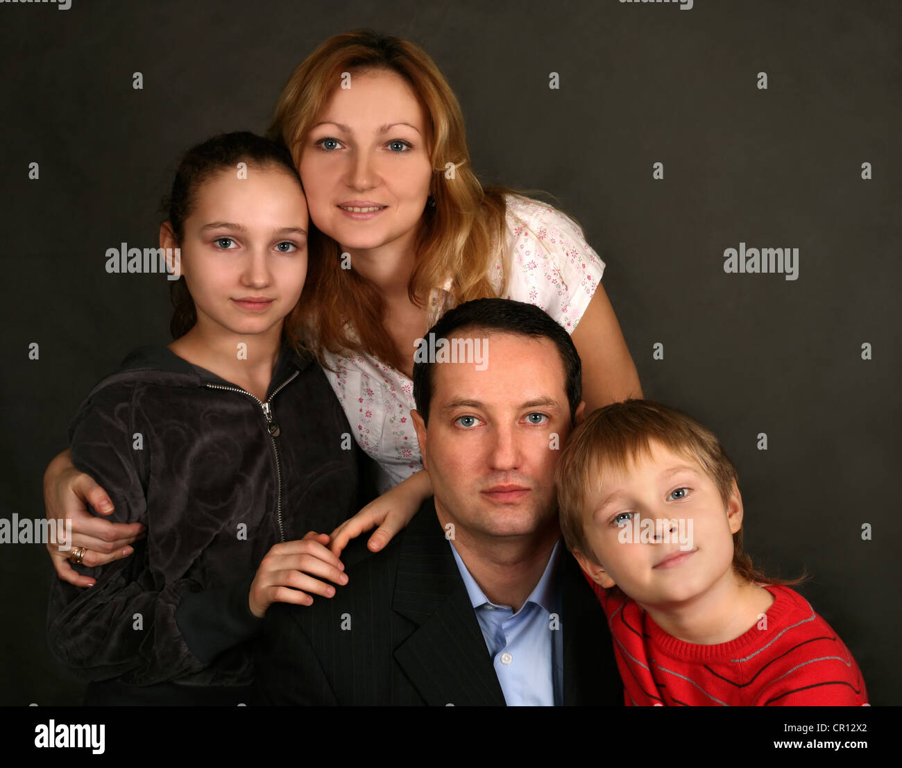 Portrait of parents and children in studio Stock Photo - Alamy