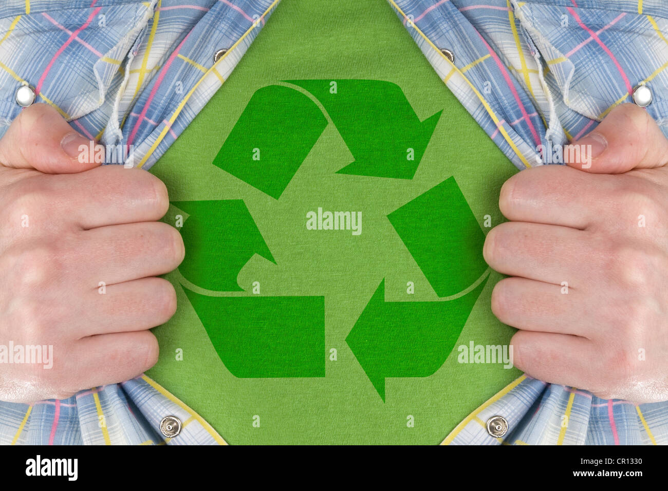 man showing the recycle symbol on a green T-Shirt Stock Photo - Alamy