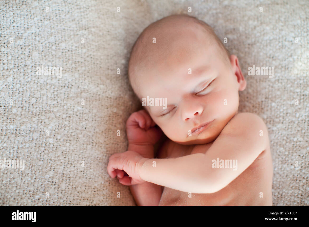 Newborn baby, 3 weeks, sleeping Stock Photo - Alamy