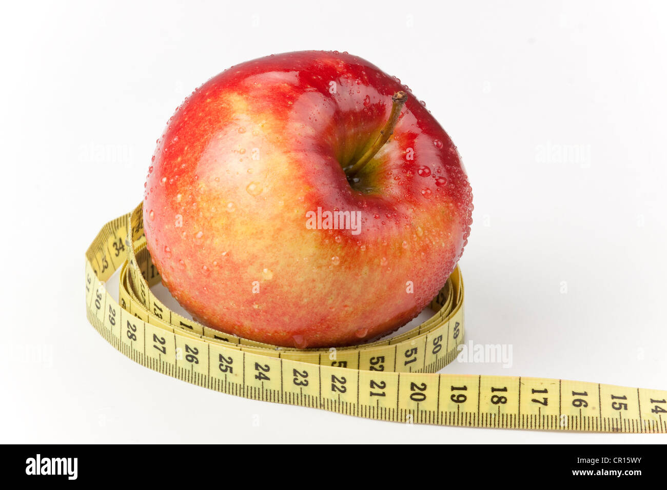 Apple with measuring tape Stock Photo - Alamy