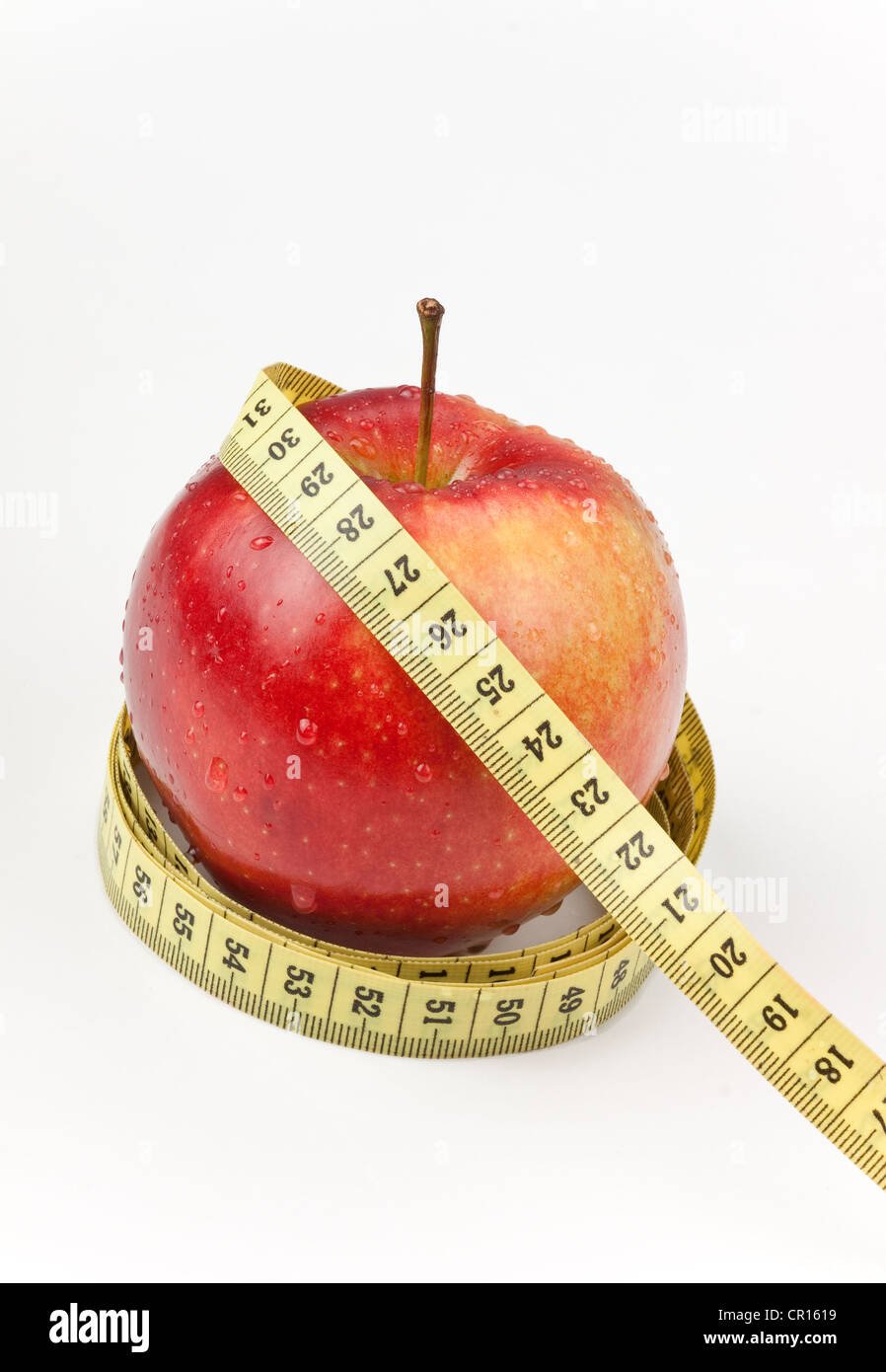 Apple with measuring tape Stock Photo - Alamy