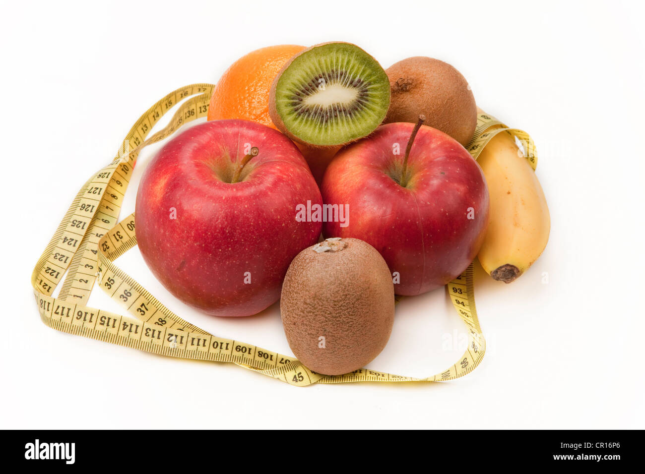Fruit with measuring tape, orange, apples, kiwi, banana Stock Photo - Alamy