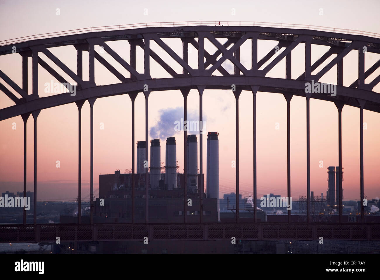 USA, New York, New York City, Bridge and smoke stacks at dusk Stock ...