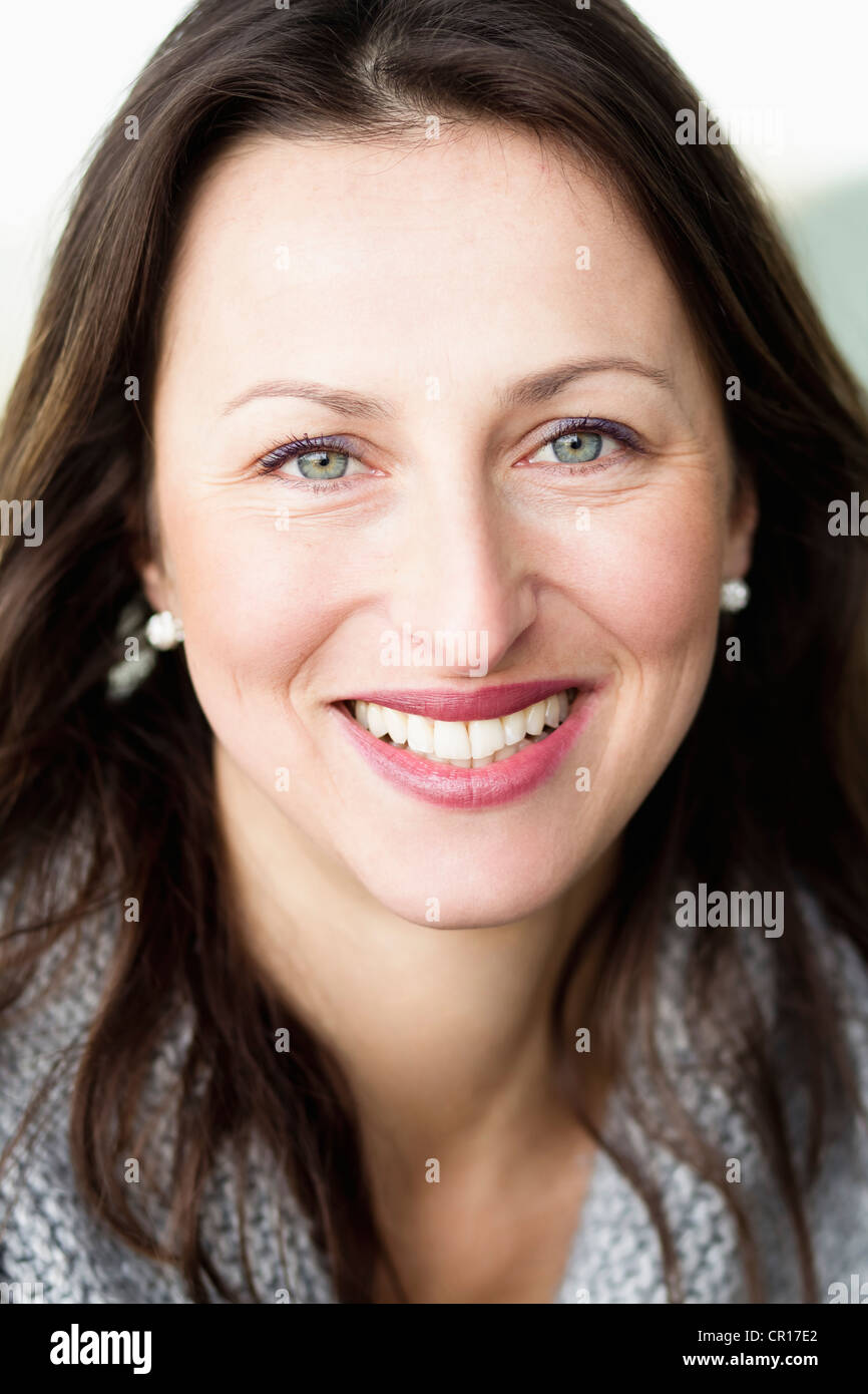 Close up of womans smiling face Stock Photo - Alamy