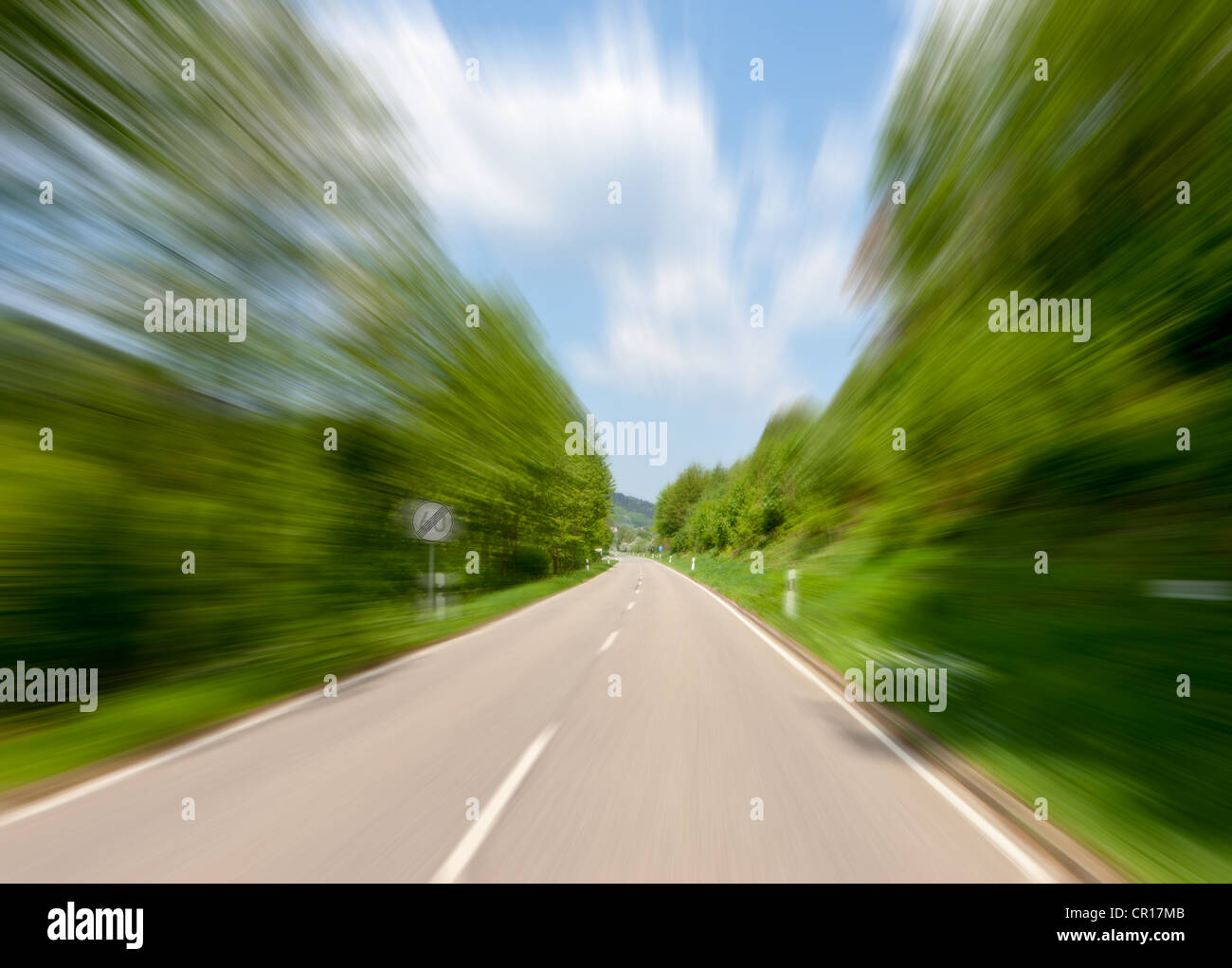 High speed motion, road with a sign showing the end of a speed limit of ...