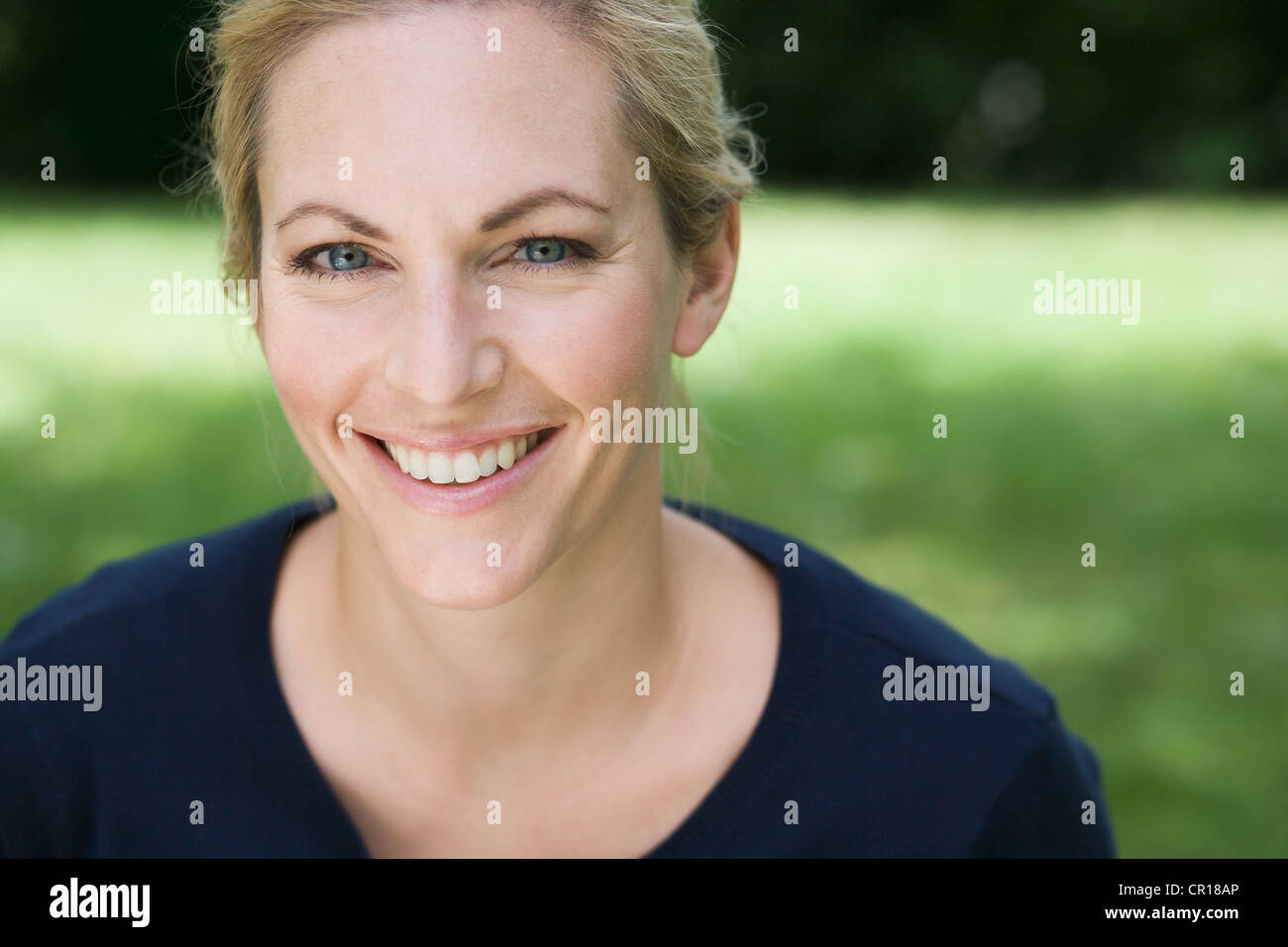 Close up of womans smiling face Stock Photo - Alamy