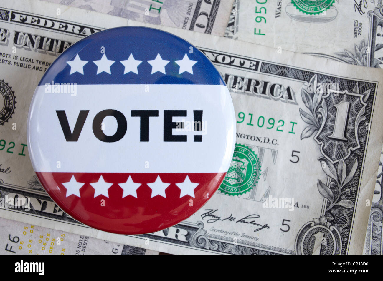 Studio shot of vote pin and one dollar banknotes Stock Photo - Alamy