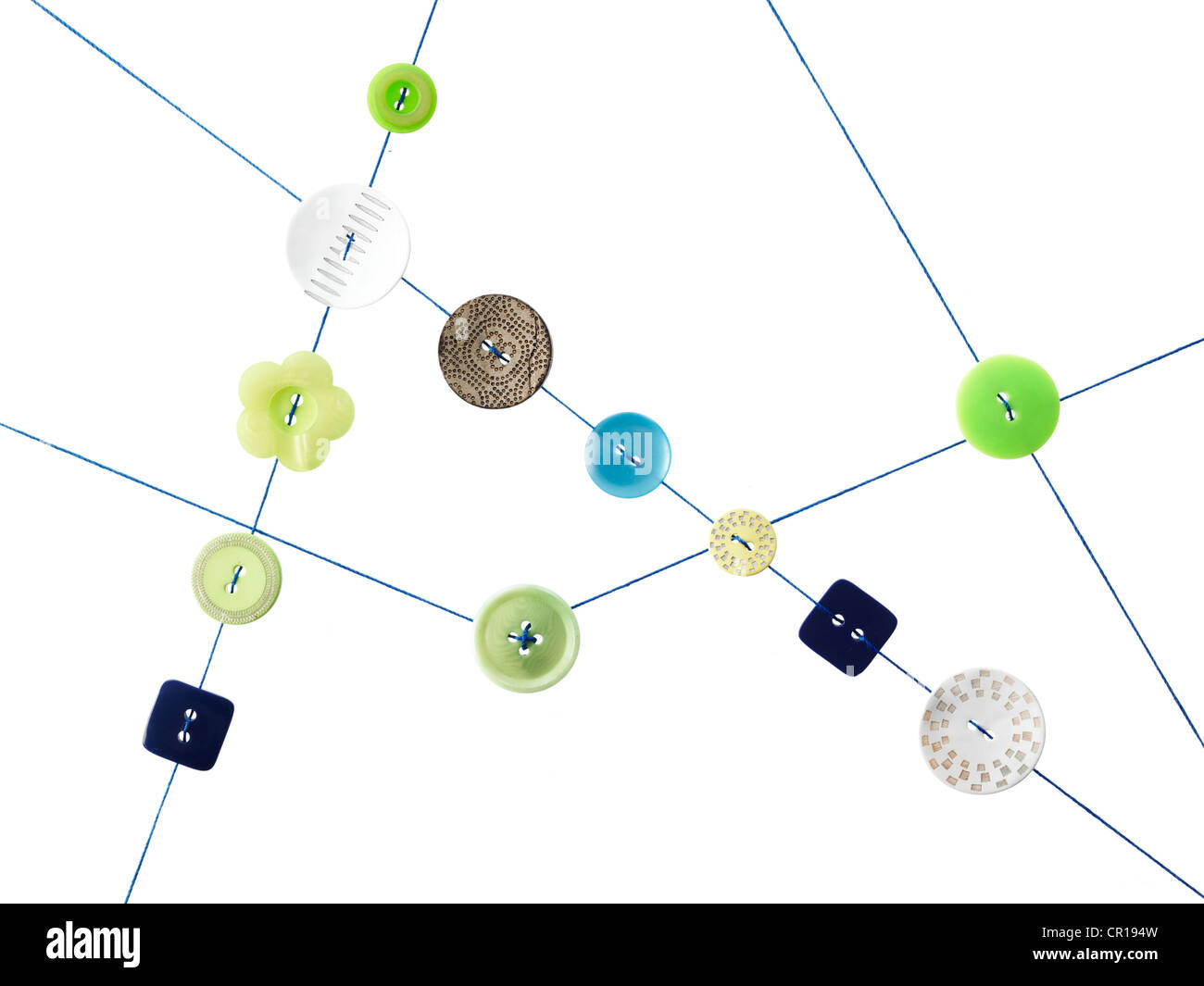 Studio shot of diagram made of thread and buttons Stock Photo - Alamy