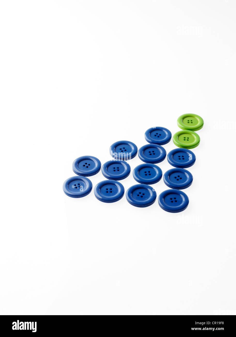 Studio shot of blue and green buttons in a row Stock Photo - Alamy