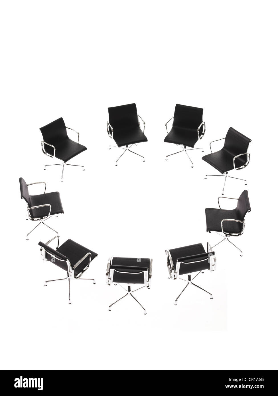 Corporate chairs forming circle on white background Stock Photo - Alamy
