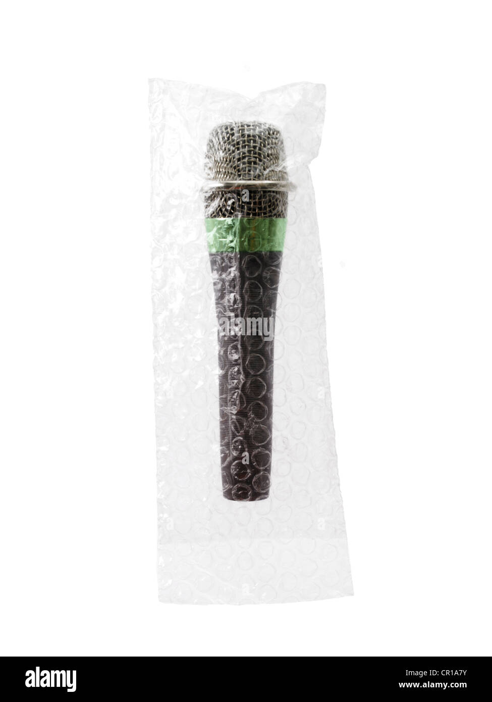 Studio shot of unplugged microphone still in bubble bag Stock Photo - Alamy