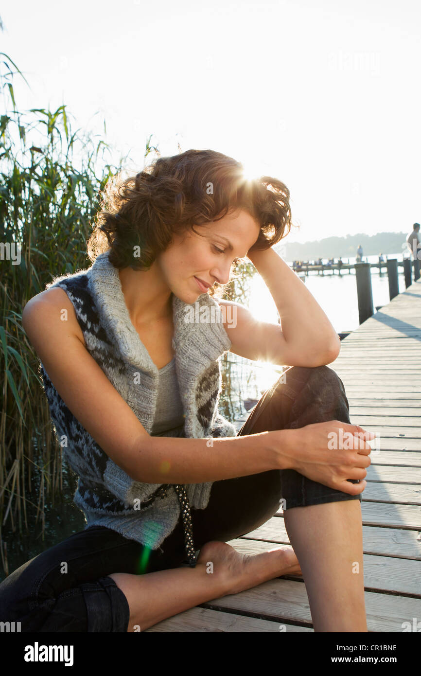 Back of lady sitting down hi-res stock photography and images - Alamy