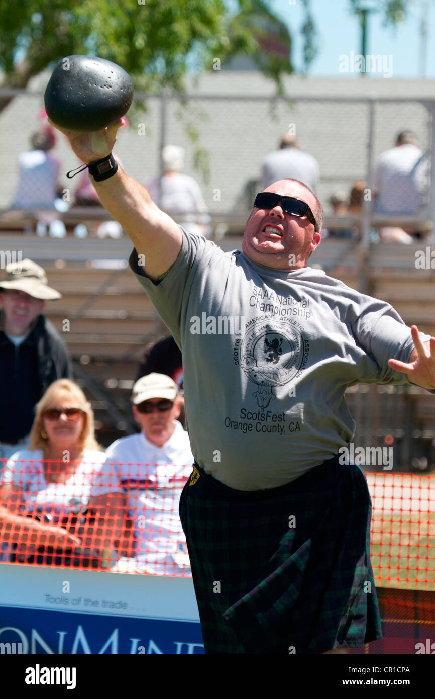 Stone Put Man Throwing Stone Highland High Resolution Stock Photography ...