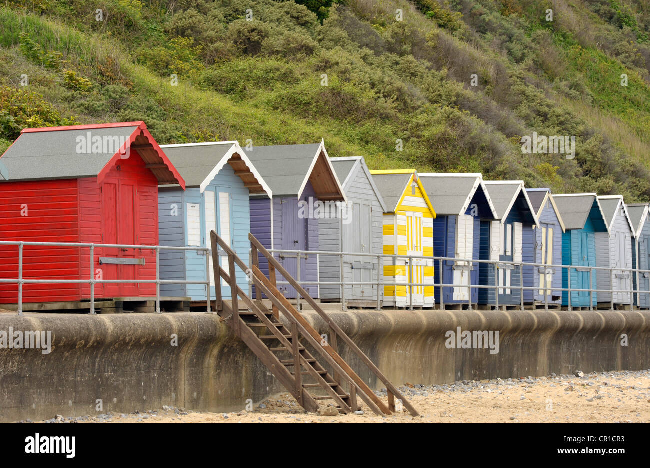 Traditional seaside beach huts along Cromer's East beach in North ...