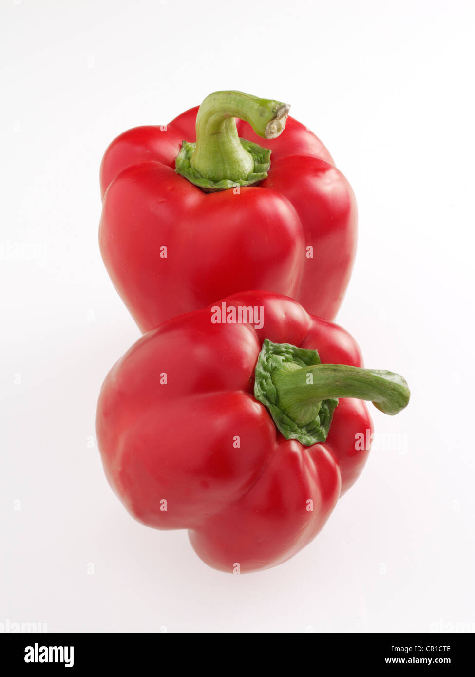 Two red peppers Stock Photo - Alamy