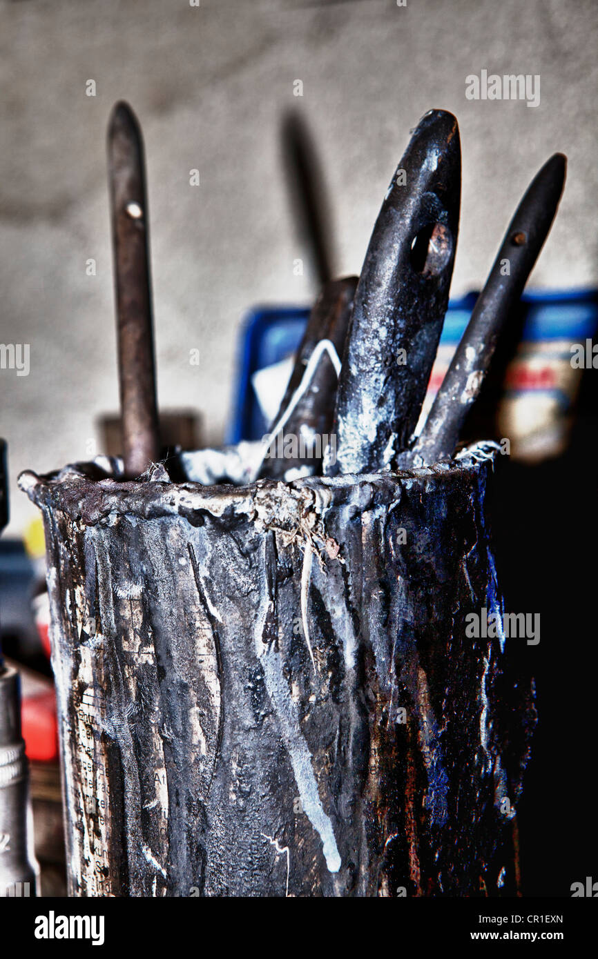 Brush in a grease-smeared pot Stock Photo - Alamy