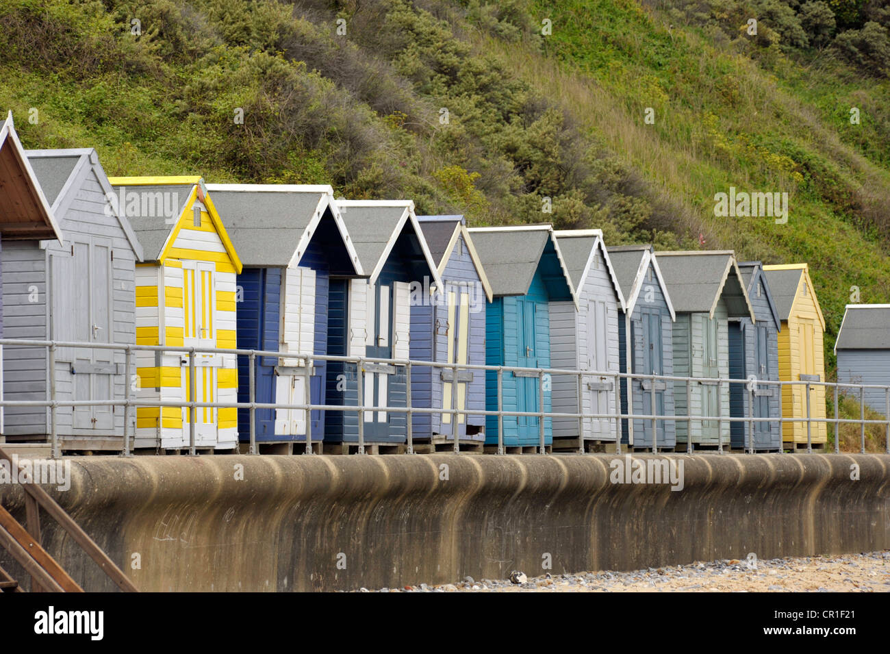 Traditional seaside beach huts along Cromer's East beach in North ...
