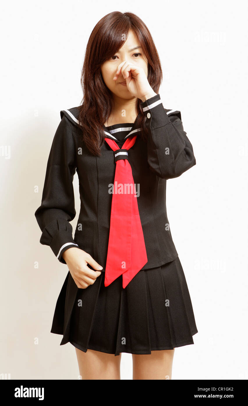 Portrait of school girl in black dress Stock Photo - Alamy