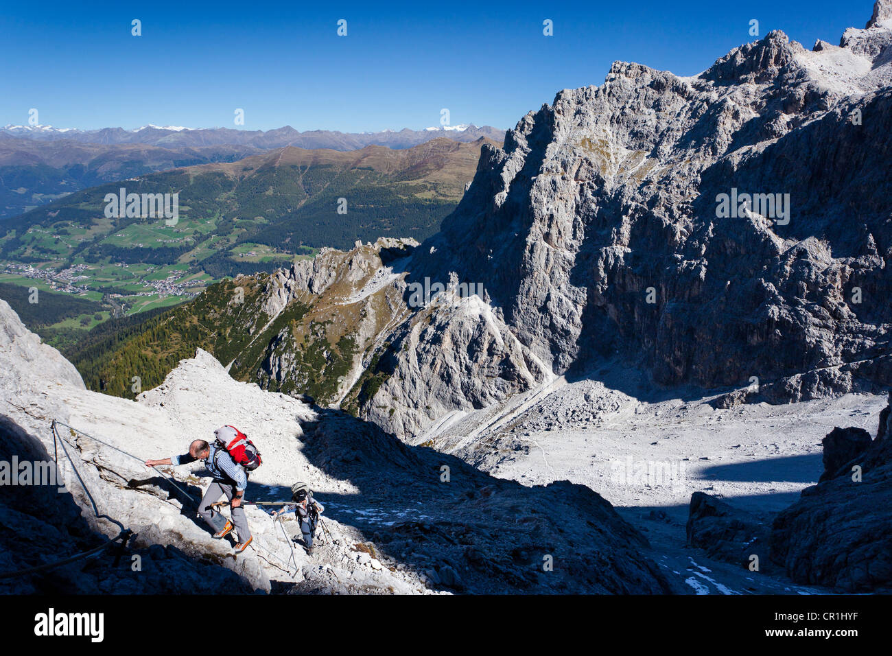 Climber heading to the Alpinisteig or Strada degli Alpini via ferrata ...