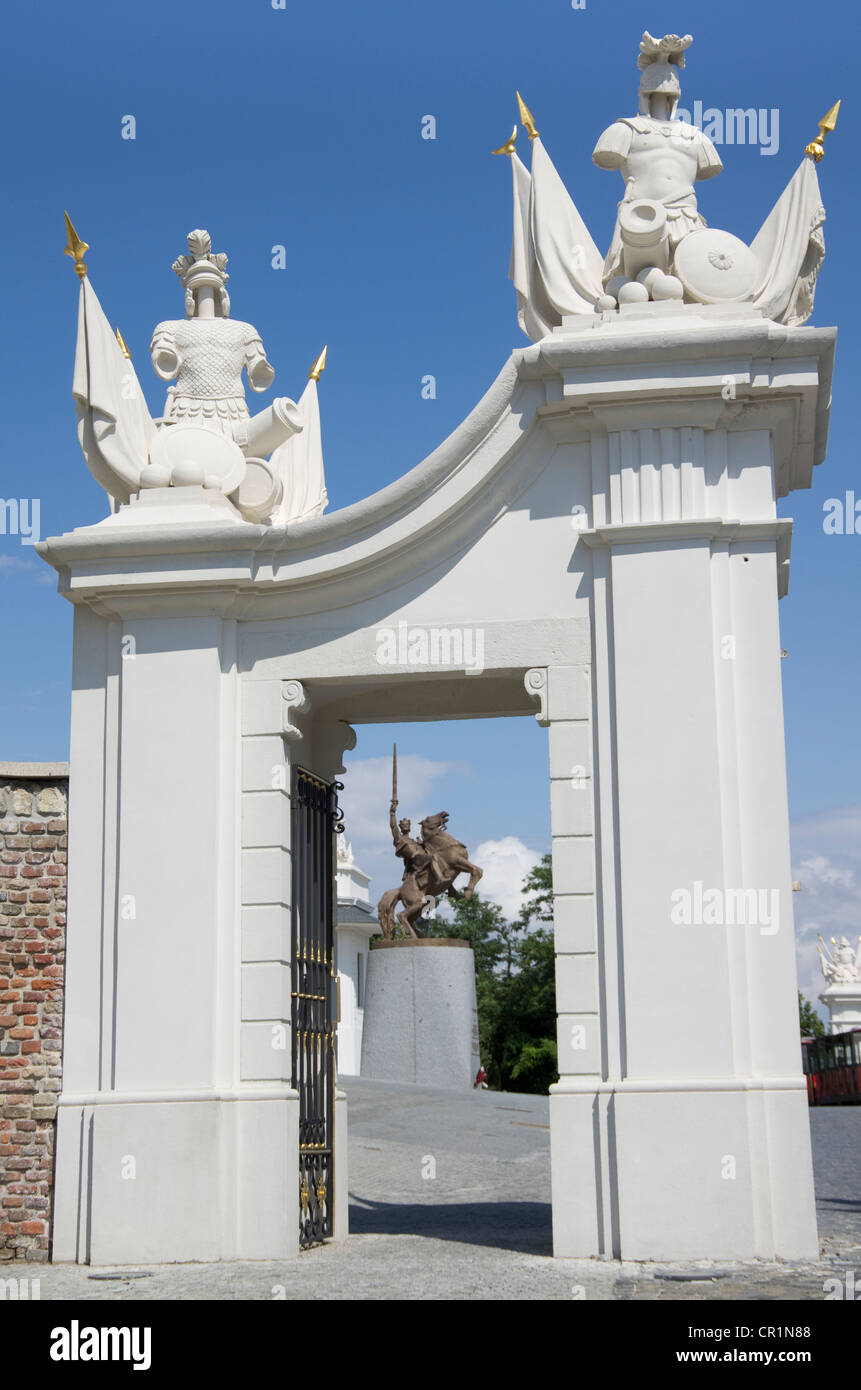 Side gate to the forecourt of the castle with statues, renovated Castle ...
