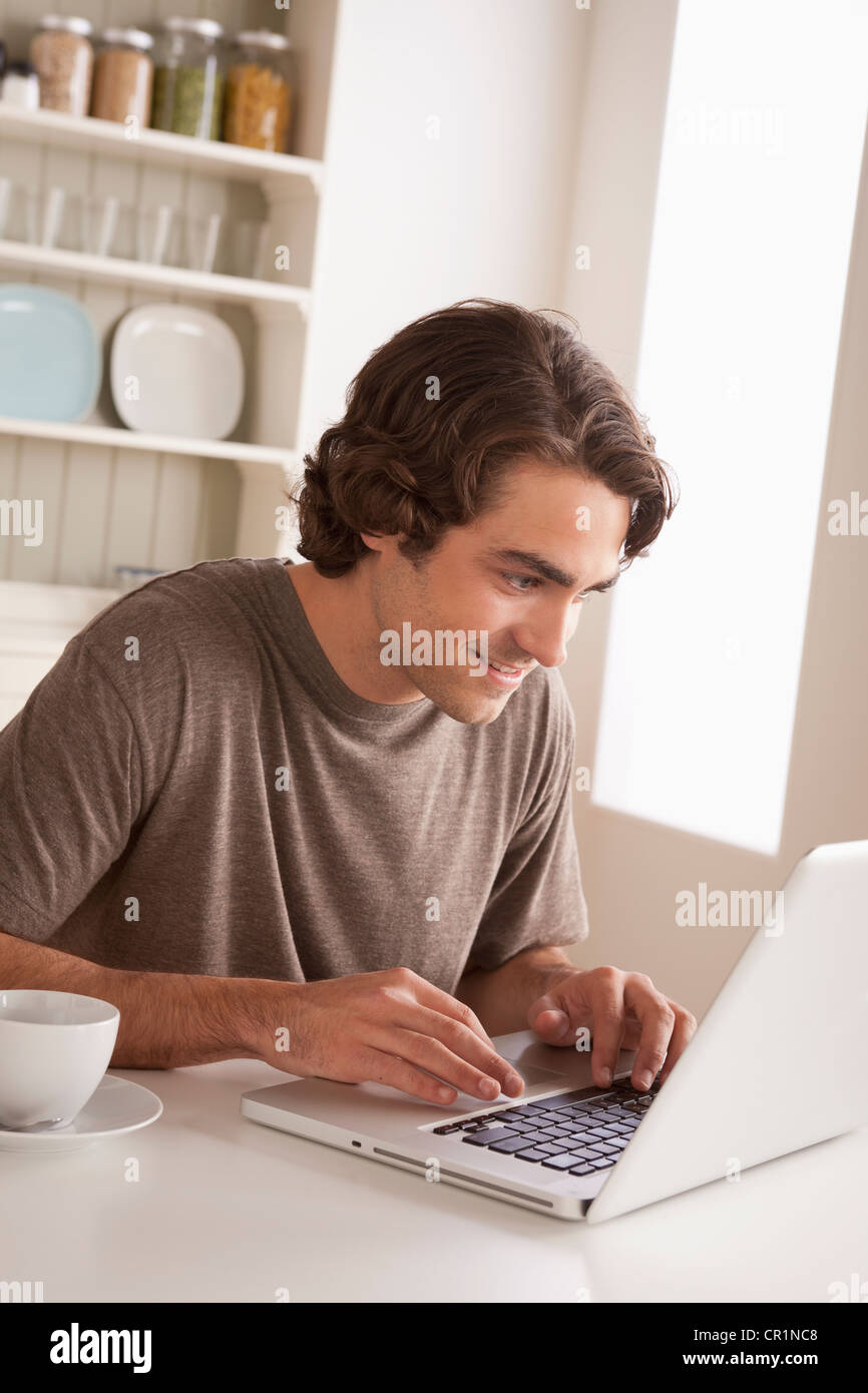 USA, California, Los Angeles, Young man using laptop Stock Photo - Alamy