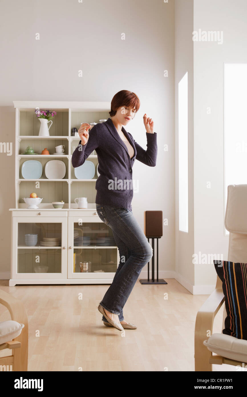 USA, California, Los Angeles, Young woman dancing at home Stock Photo ...