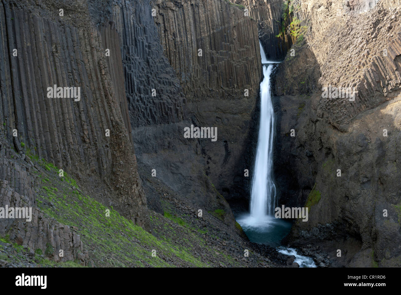 Litlanesfoss waterfall framed by columns of basalt, Iceland, Europe ...
