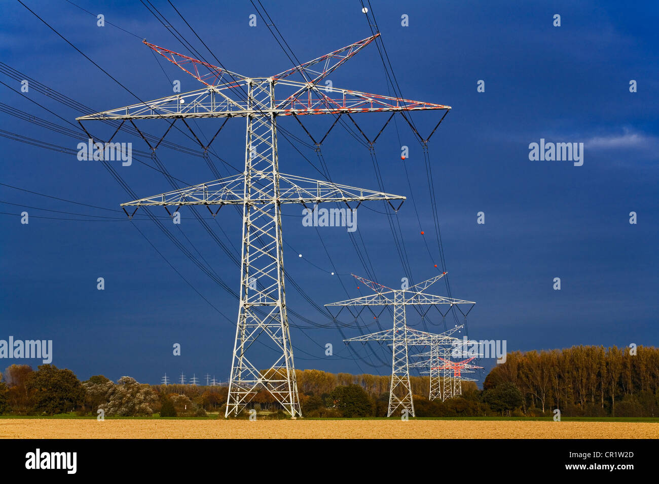 Power poles with power lines, near Dortmund, North Rhine-Westphalia ...