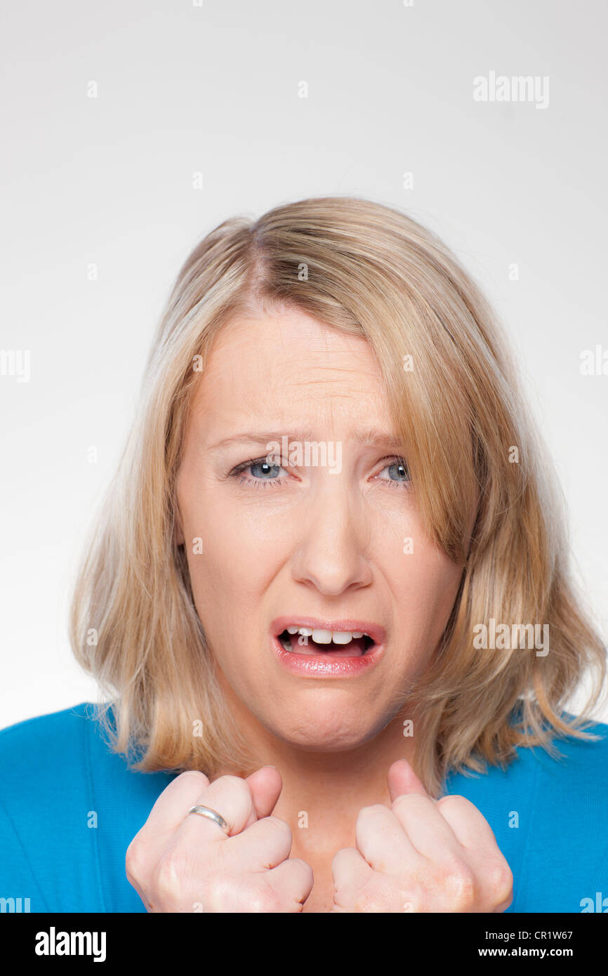 Angry mid adult woman studio hi-res stock photography and images - Alamy