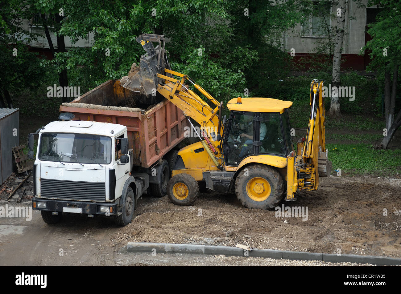 Tractor. Cleaning the yard Stock Photo - Alamy