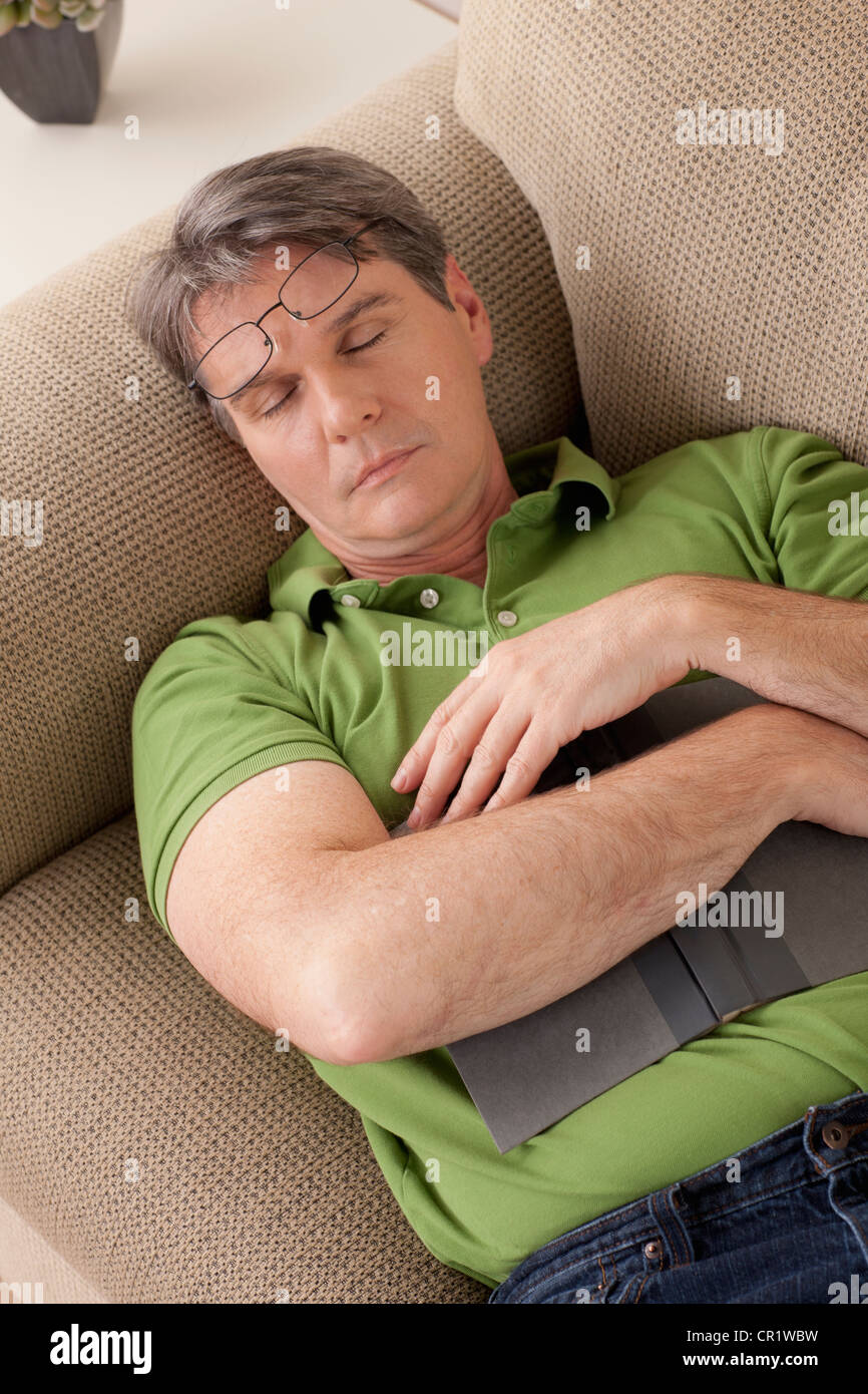 USA, California, Los Angeles, Man napping on couch Stock Photo - Alamy