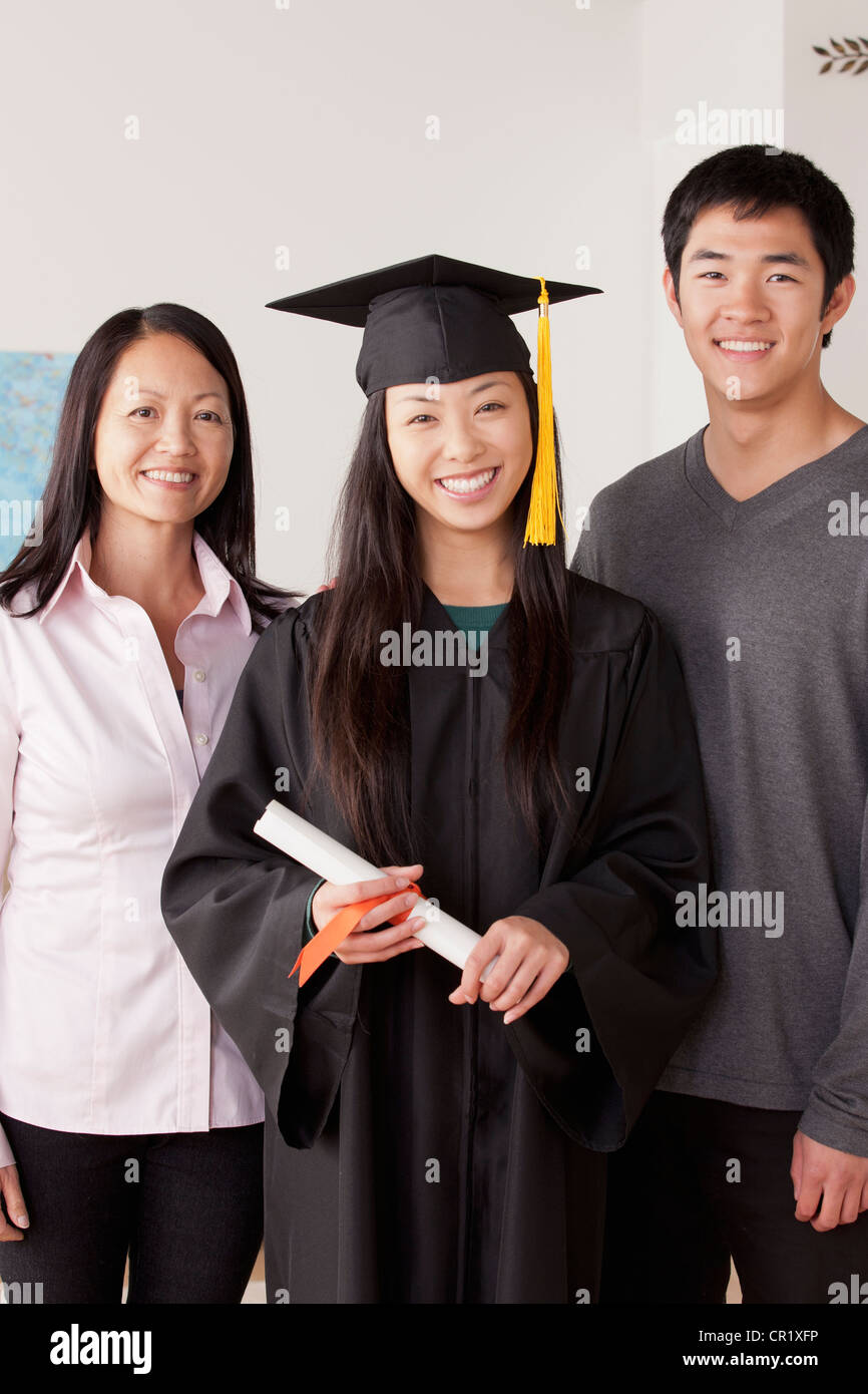 USA, California, Los Angeles, Portrait of young woman in graduation ...