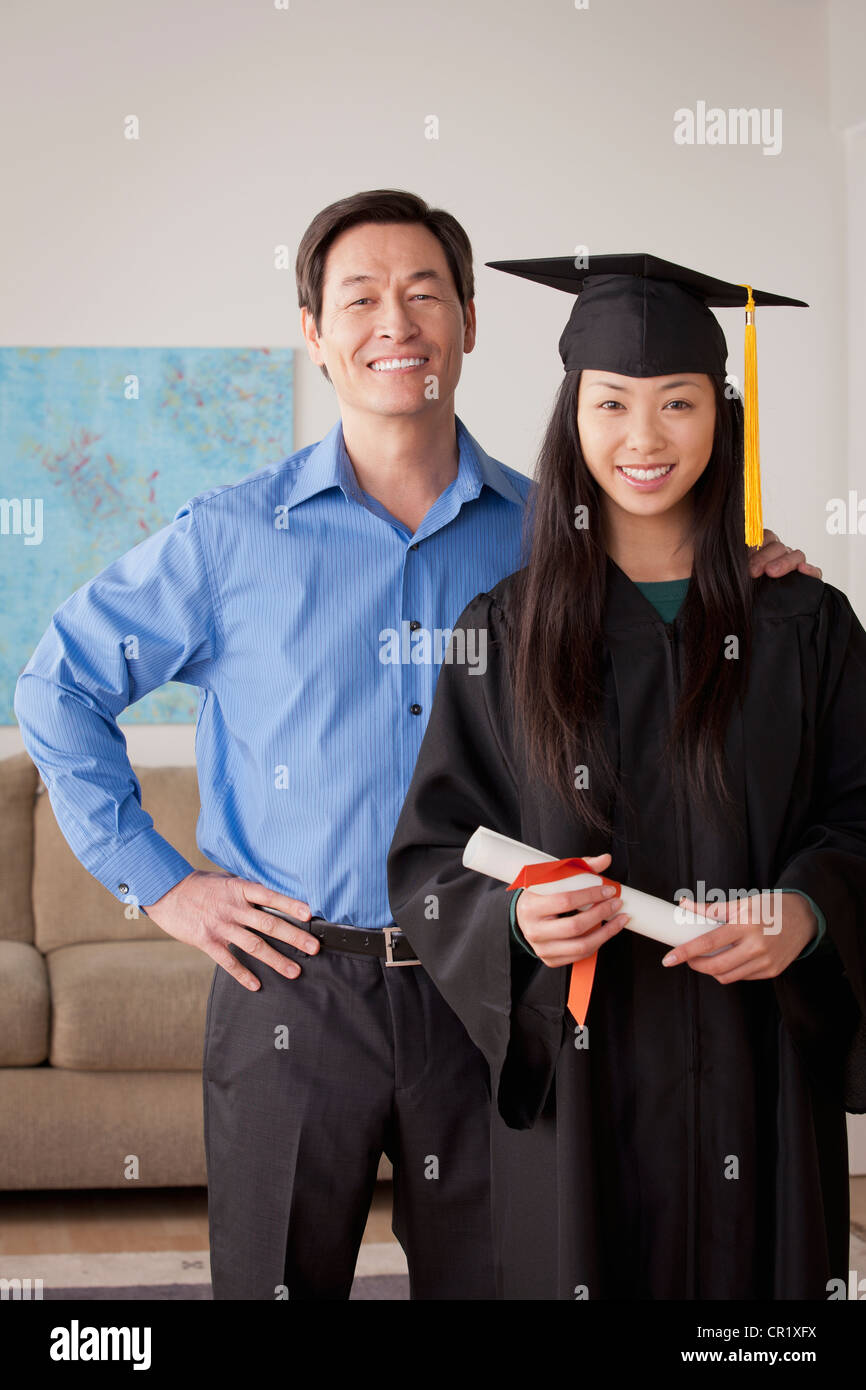 Mother father daughter graduation hi-res stock photography and images ...