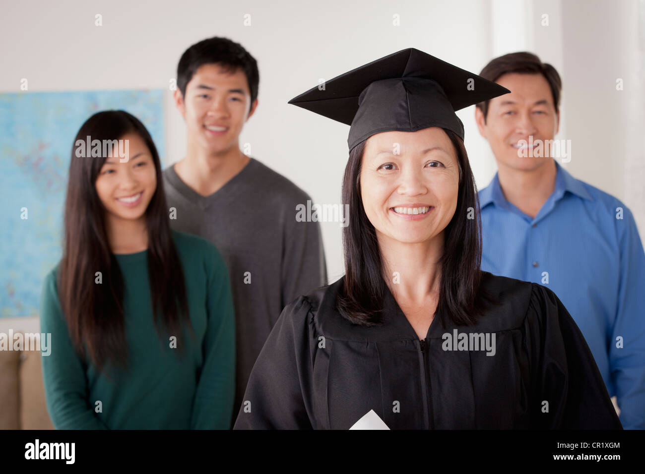 USA, California, Los Angeles, Portrait of mature woman in graduation ...