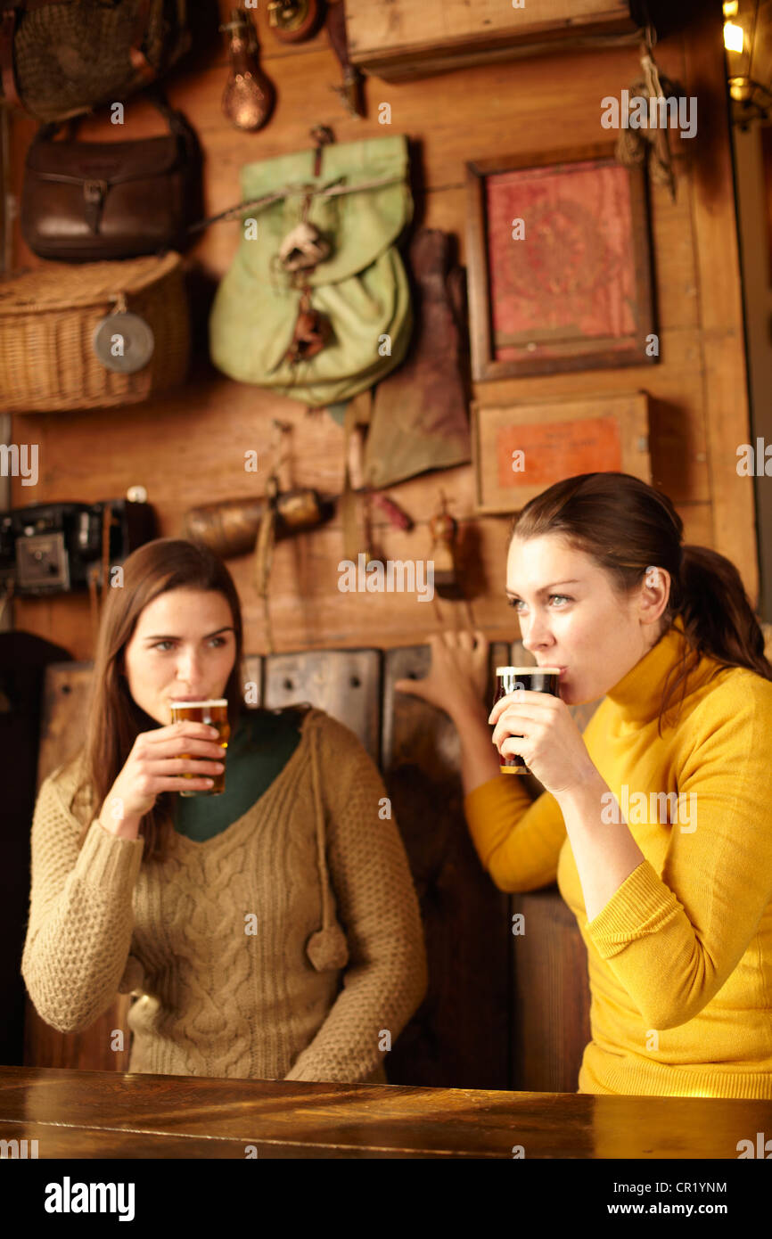 Women having beer in pub Stock Photo - Alamy