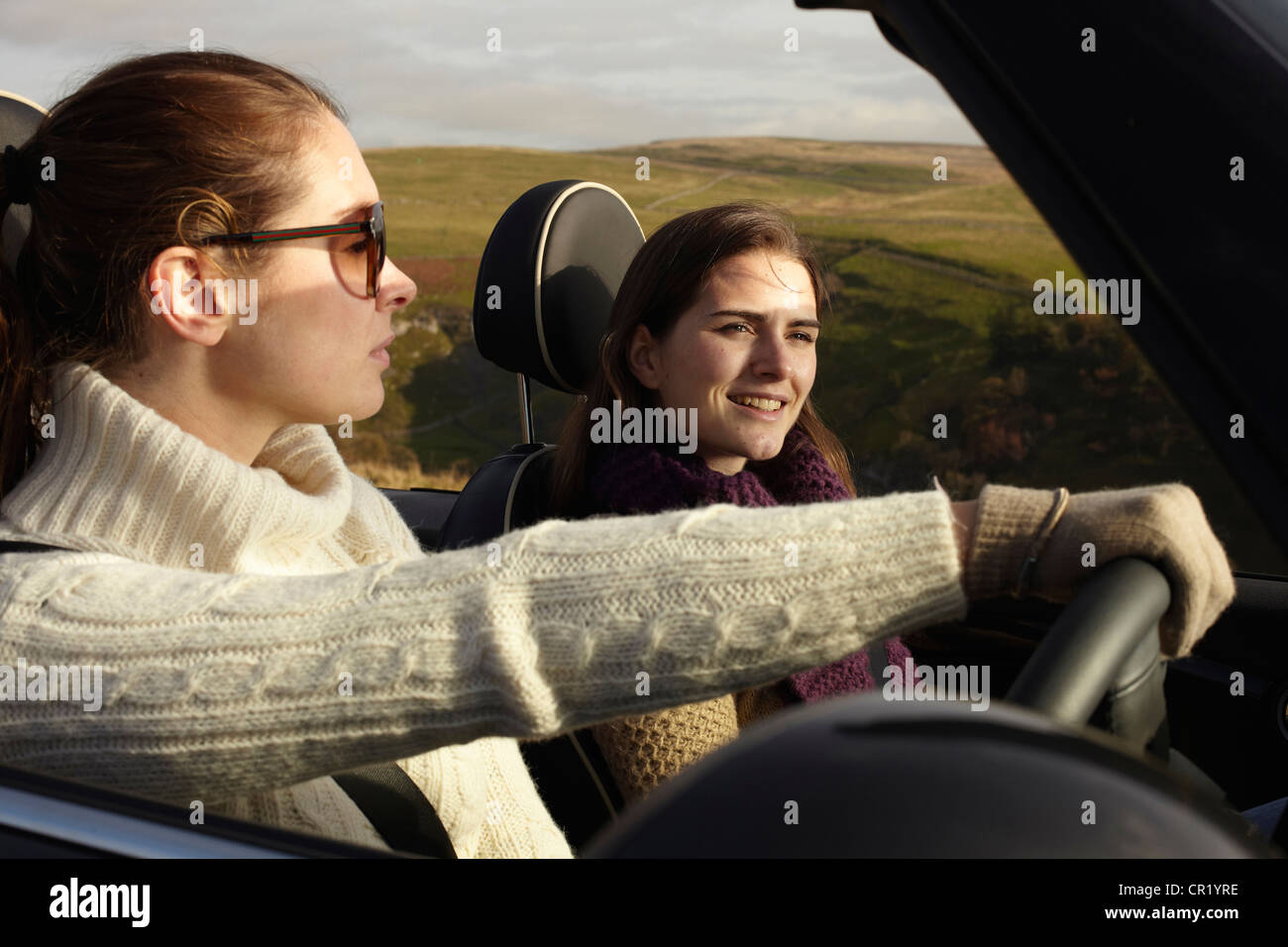 Women driving in rural landscape Stock Photo - Alamy