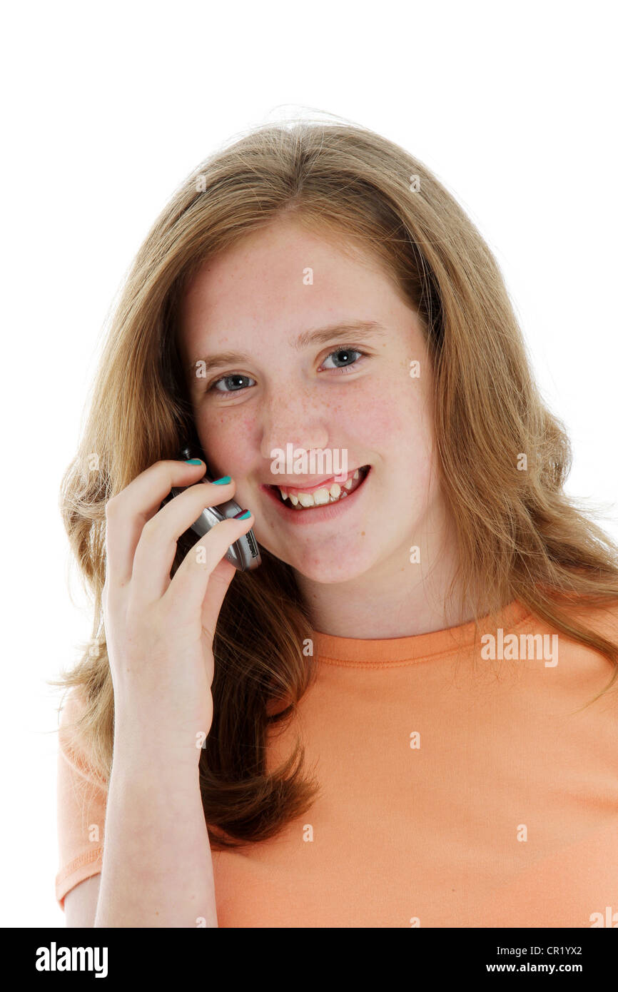 Teen talking on a cell phone with white background Stock Photo - Alamy