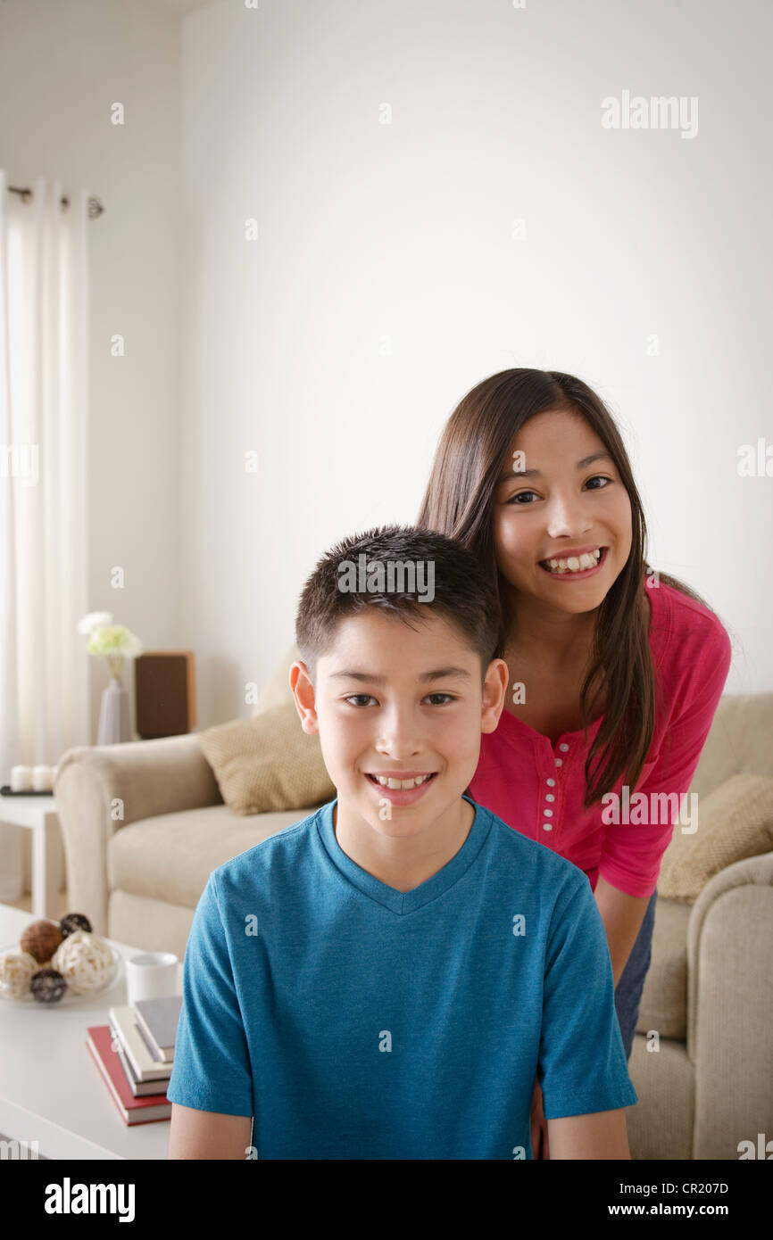USA, California, Los Angeles, Portrait of smiling brother (10-11) and ...